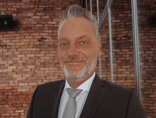 Executives at Benchmark International